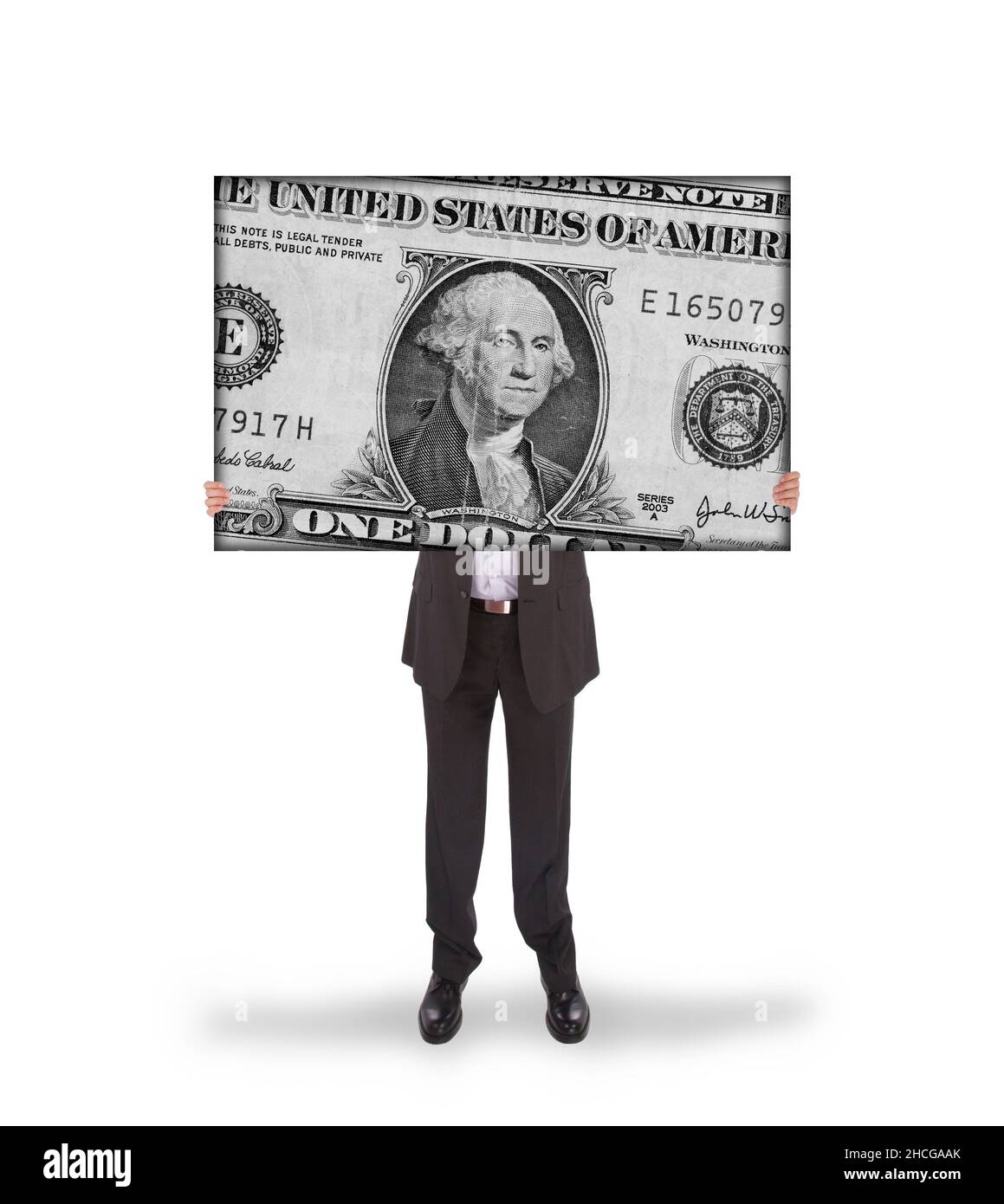 Business man holding a very large dollar bill Stock Photo - Alamy