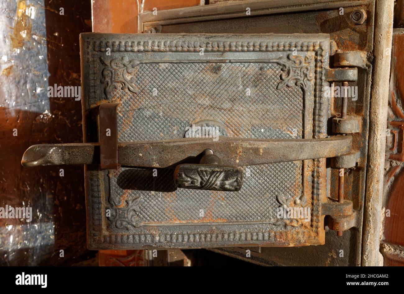 Traditional coal-fired heating furnace with decorative doors Stock ...