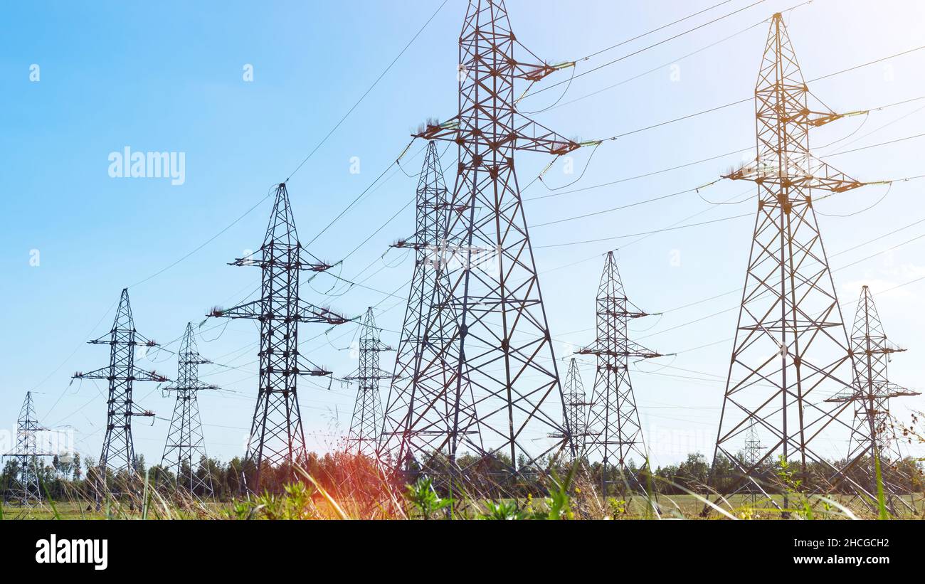 Transmission pylons with high-voltage power lines with copy space ...