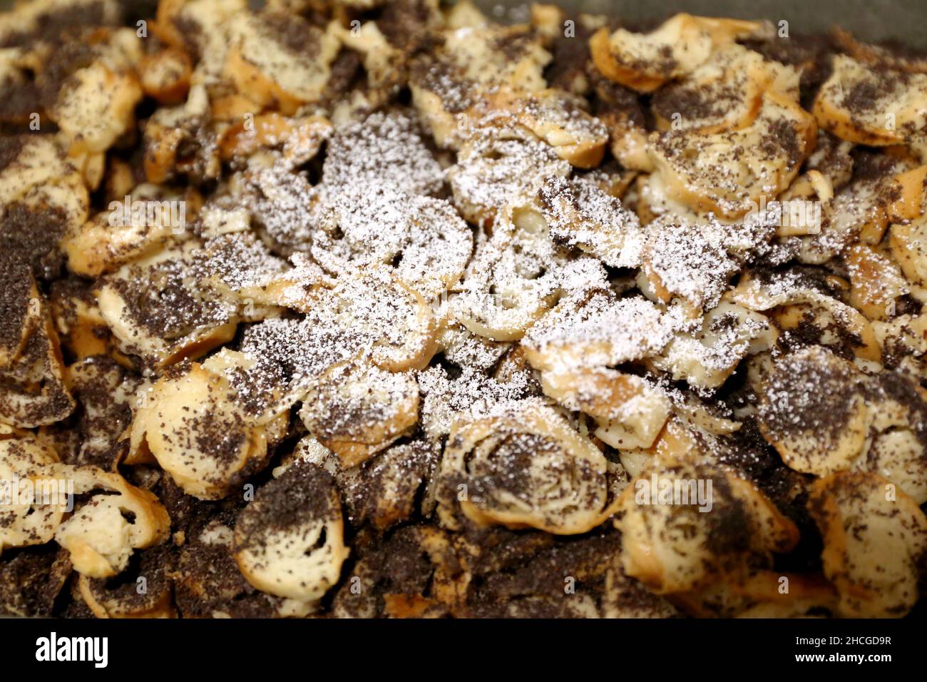 Homemade specialty sweetness with poppy seeds and raisins dish at ...