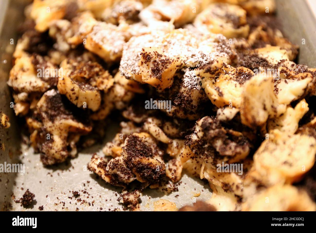 Homemade specialty sweetness with poppy seeds and raisins dish at ...