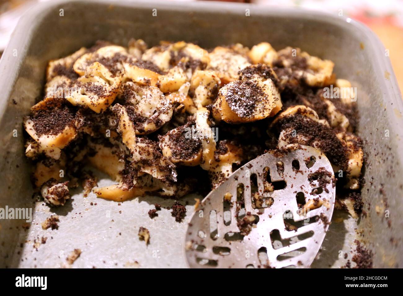 Homemade specialty sweetness with poppy seeds and raisins dish at ...