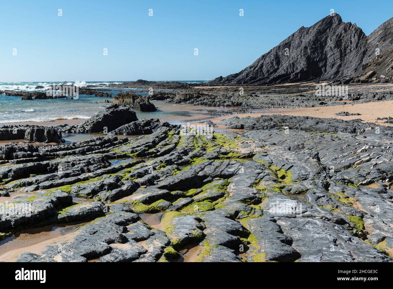 Beautiful geological rock formations at the beach of Praia da Amoreira ...