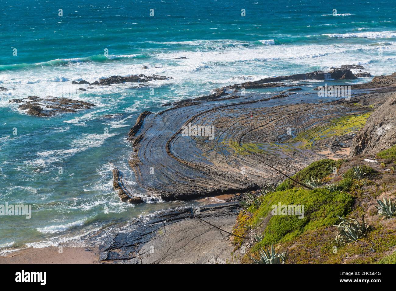 Beautiful geological rock formations at the beach of Praia da Amoreira ...