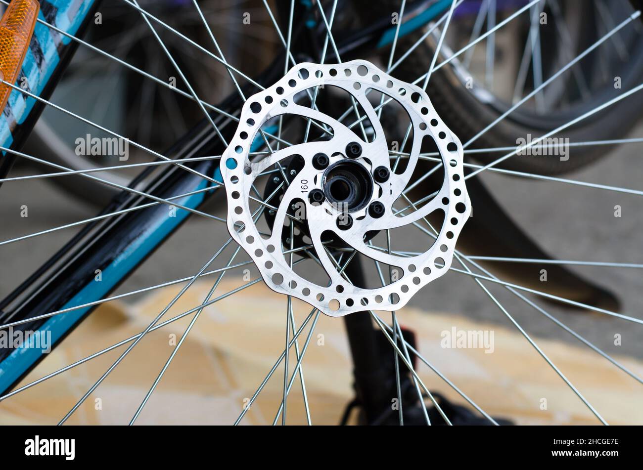 Disc brake of a front bicycle wheel close-up. Bicycle repair Stock ...