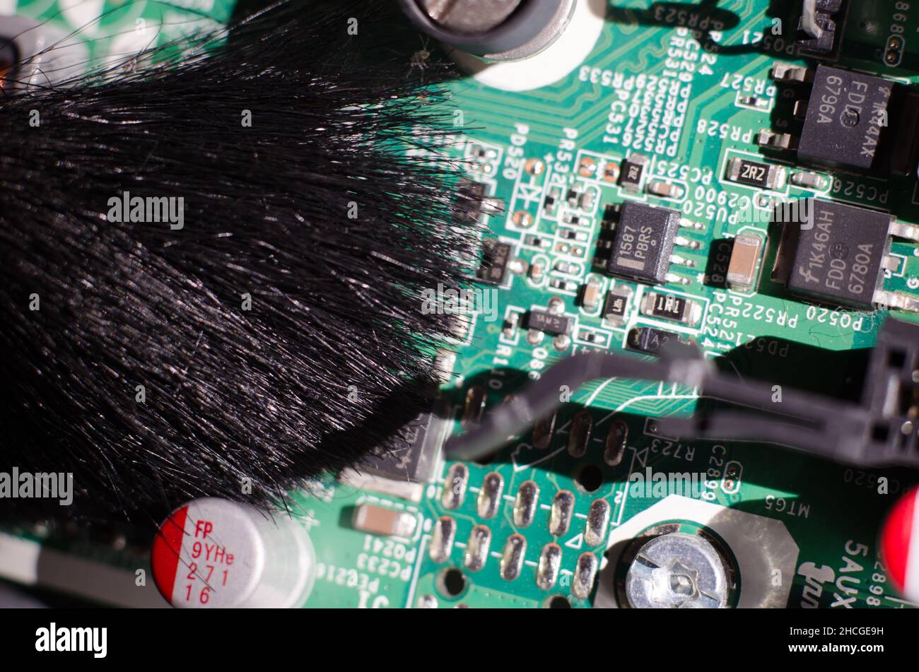 Cleaning the motherboard of a personal computer. Maintenance and repair ...