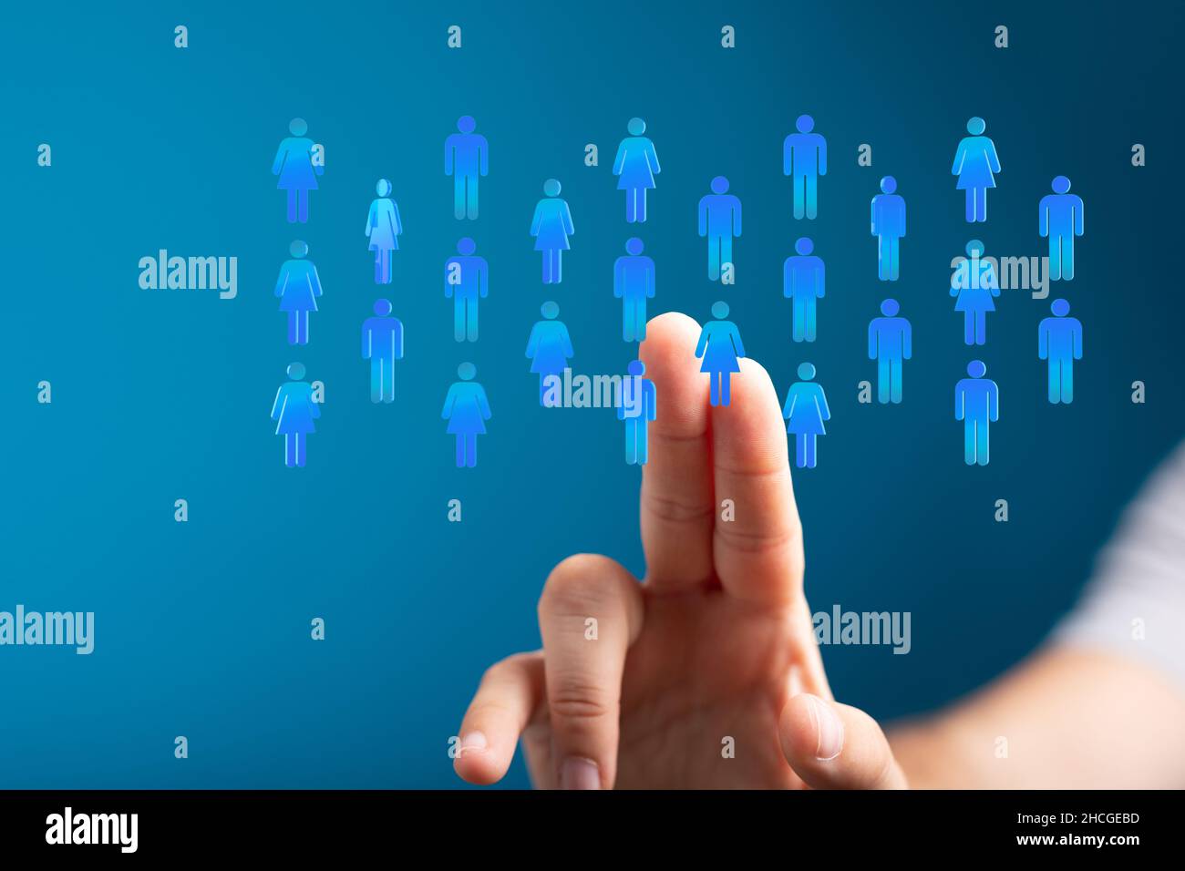 Closeup of the hand touching the digital human figures Stock Photo - Alamy