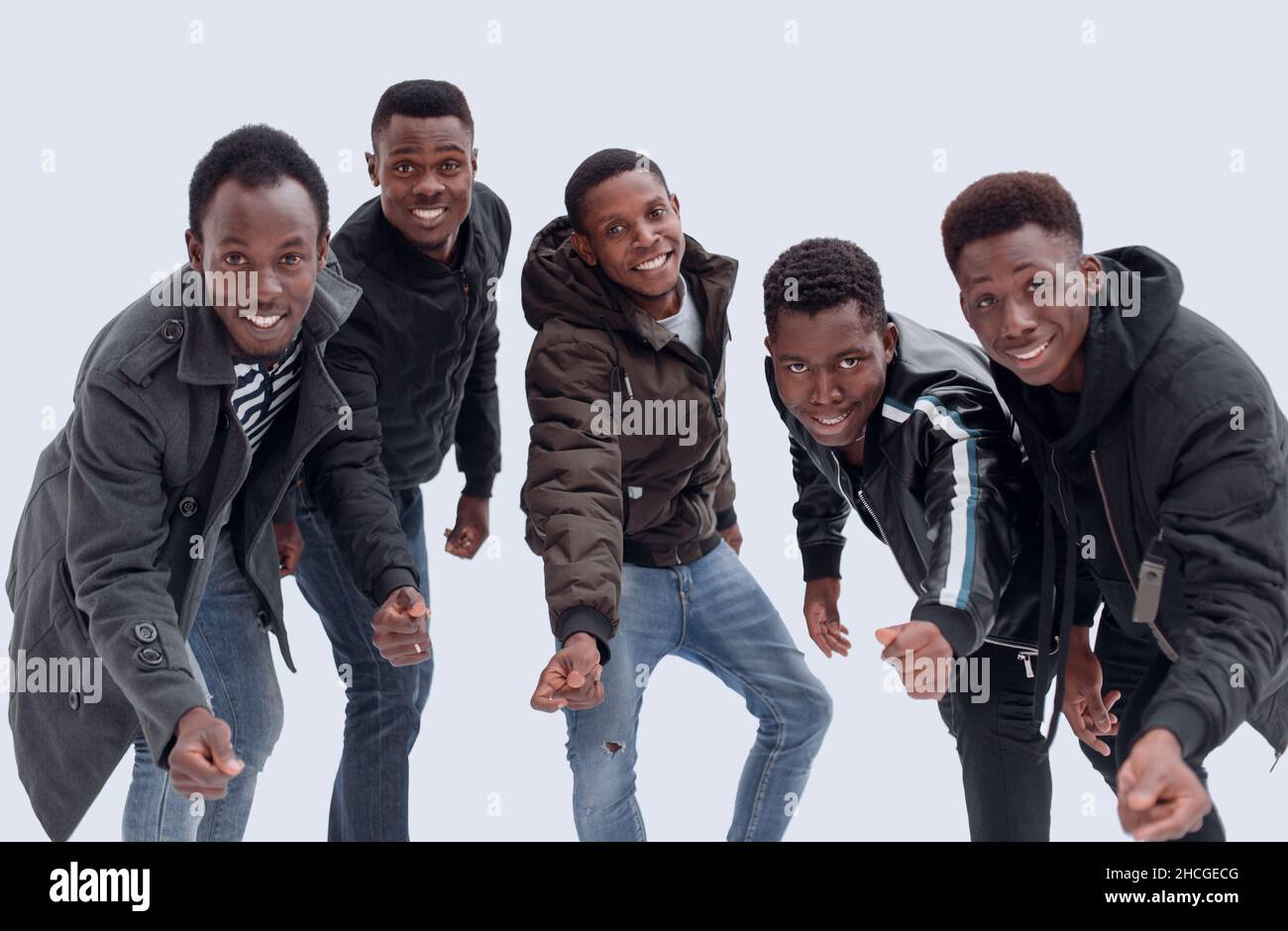 group of cheerful guys starting to the goal together Stock Photo - Alamy