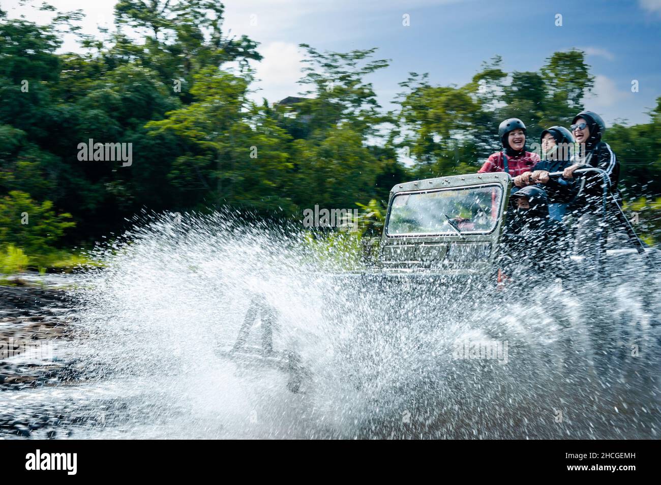 An old jeep willys goes through puddles and makes a splash Stock Photo ...