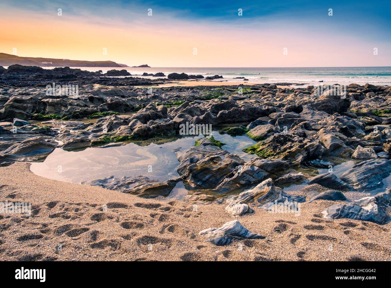 Rocks and rock pools at low tide at the secluded Little Fistral in ...