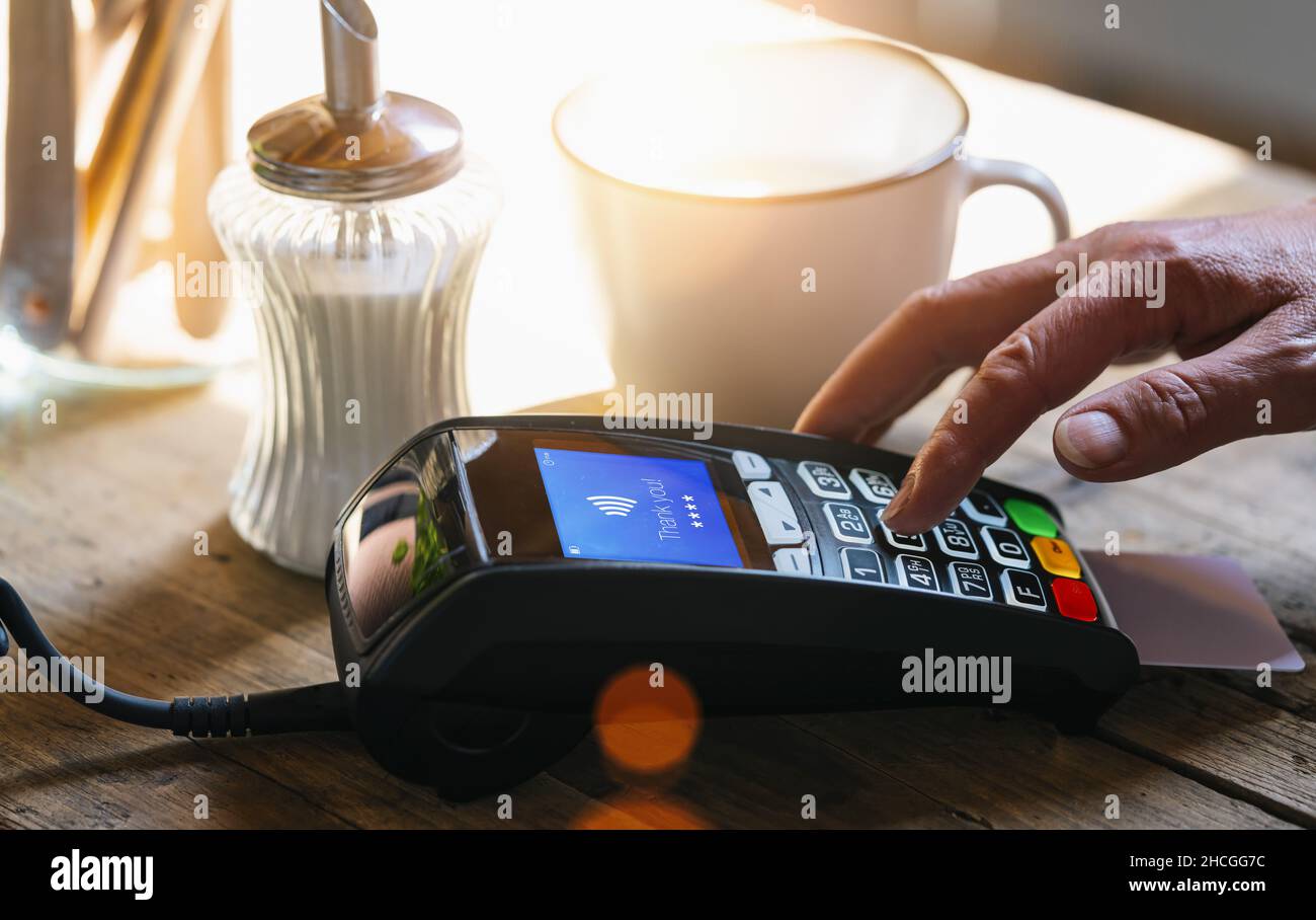 Hand enters hi-res stock photography and images - Alamy