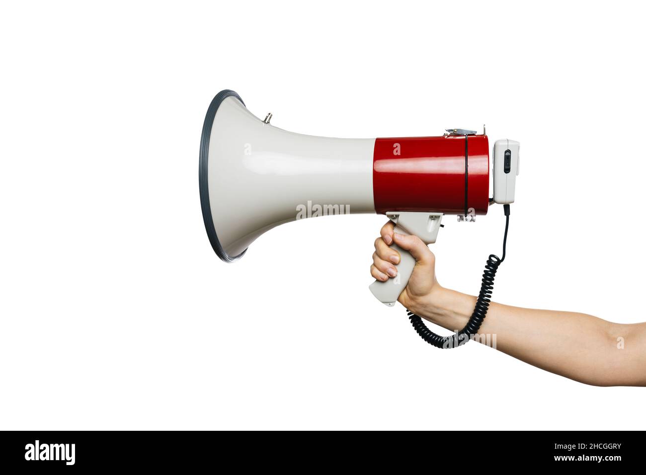 Man hand holding a Red and white bullhorn or megaphone in his hand ... Man hand holding a Red and white bullhorn or megaphone in his hand ...