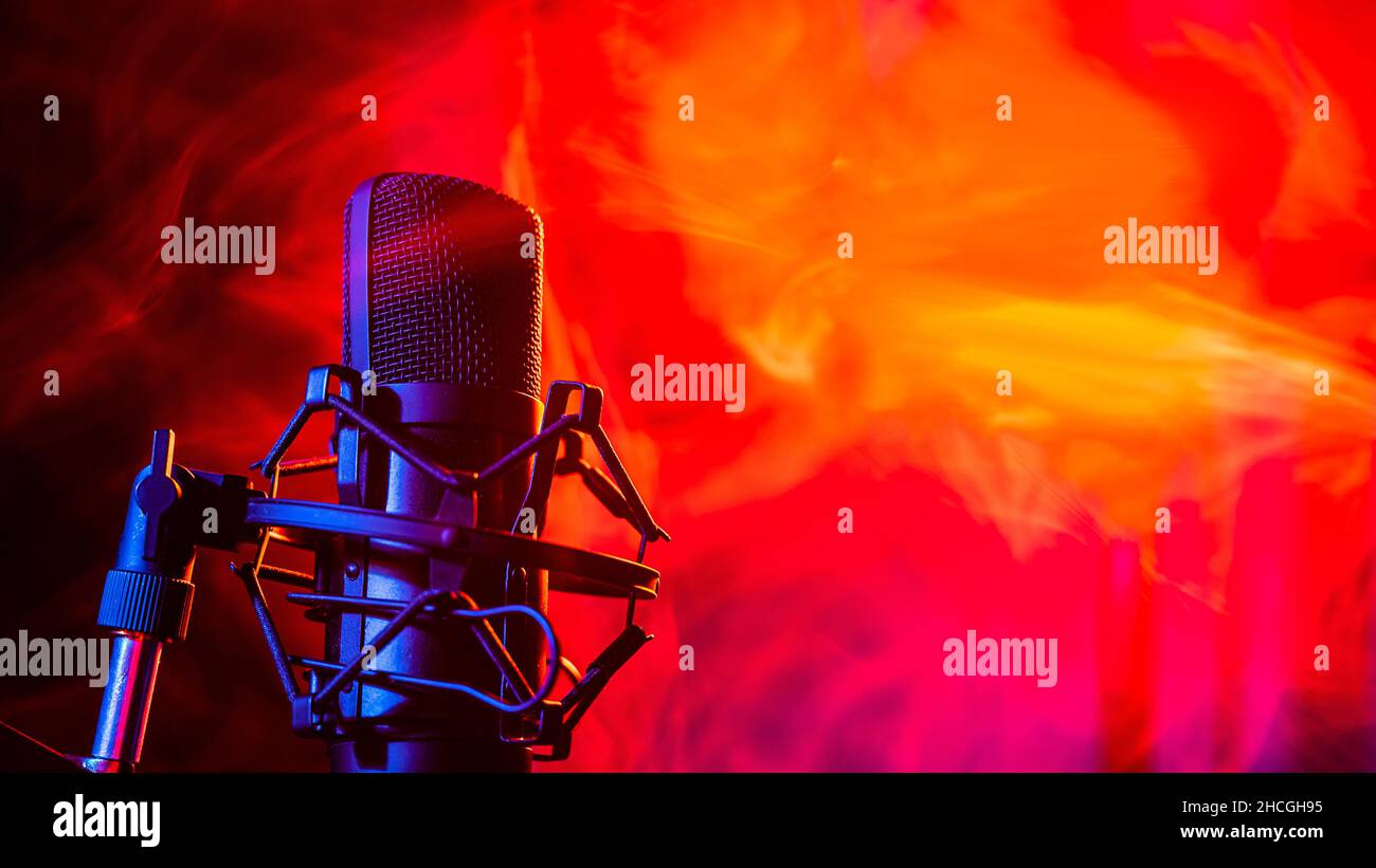 Professional microphone in red smoke on a black background Stock Photo ...