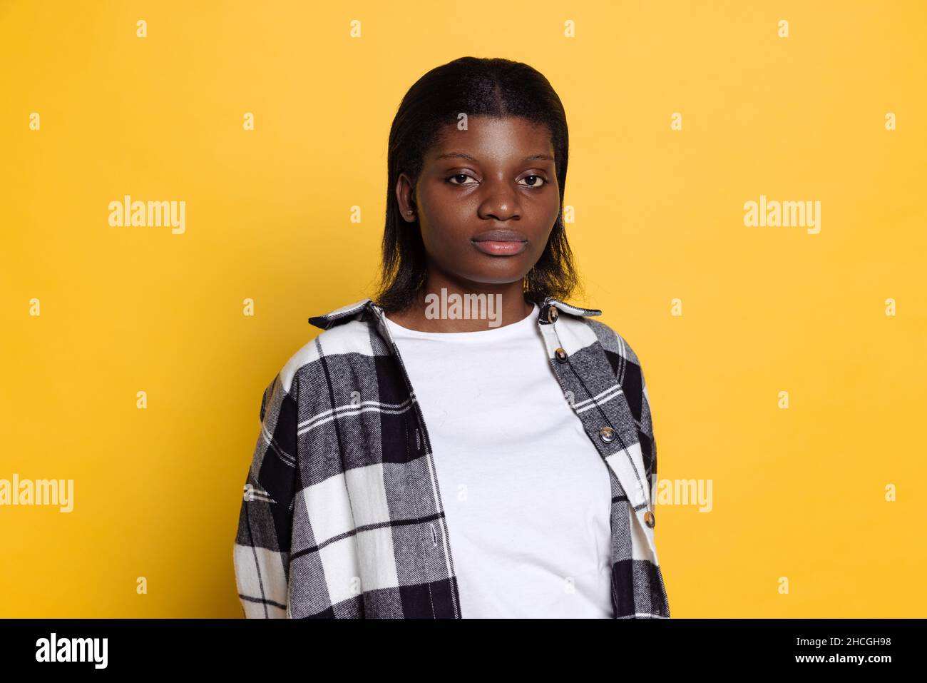 Close Up Portrait Of Young Beautiful Dark Skinned Girl Looking At