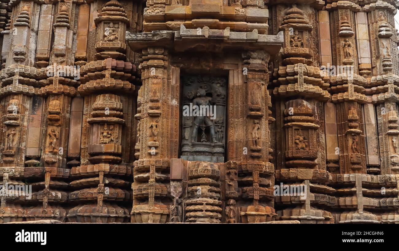 A vertical shot of a sculpture carved on the Ananta Vasudev Temple in ...