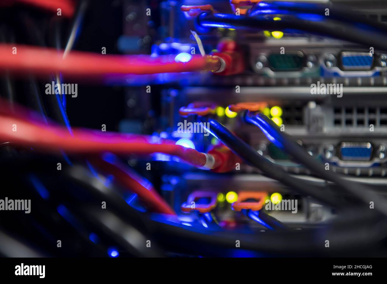 network server room closeup on fiber optic hub or switch for digital ...