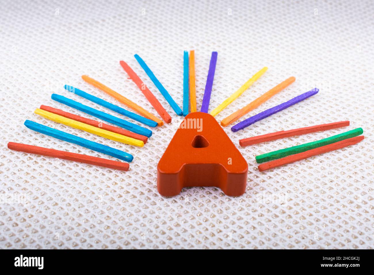 Letter A with colorful sticks on a white cover Stock Photo - Alamy