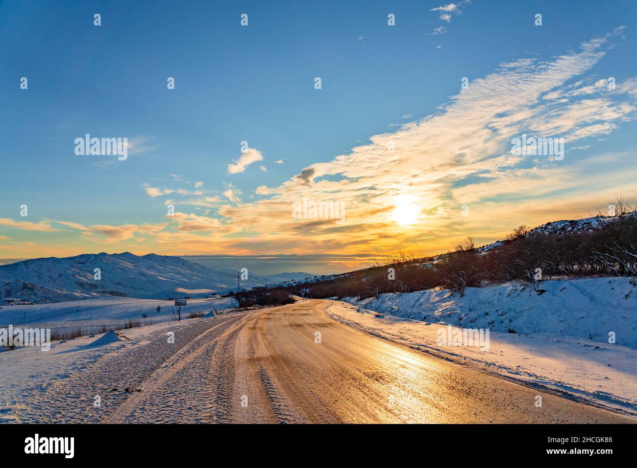 Icy slippery asphalt road in highlands Stock Photo - Alamy