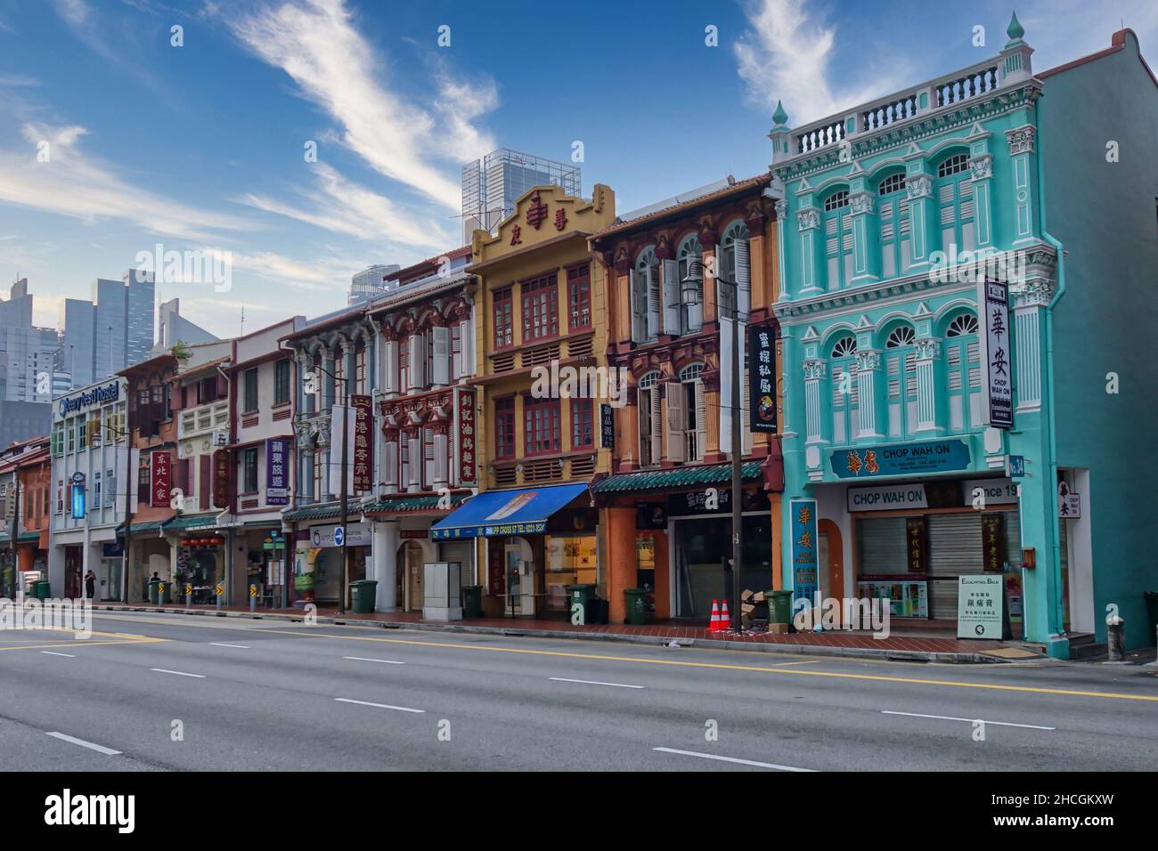 Facade of beautiful colorful historic houses on the Upper Cross Street ...