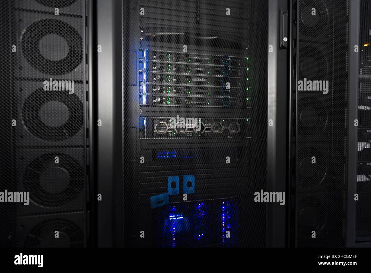 Data Center With Multiple Rows of Fully Operational Server Racks. Modern Telecommunications ...