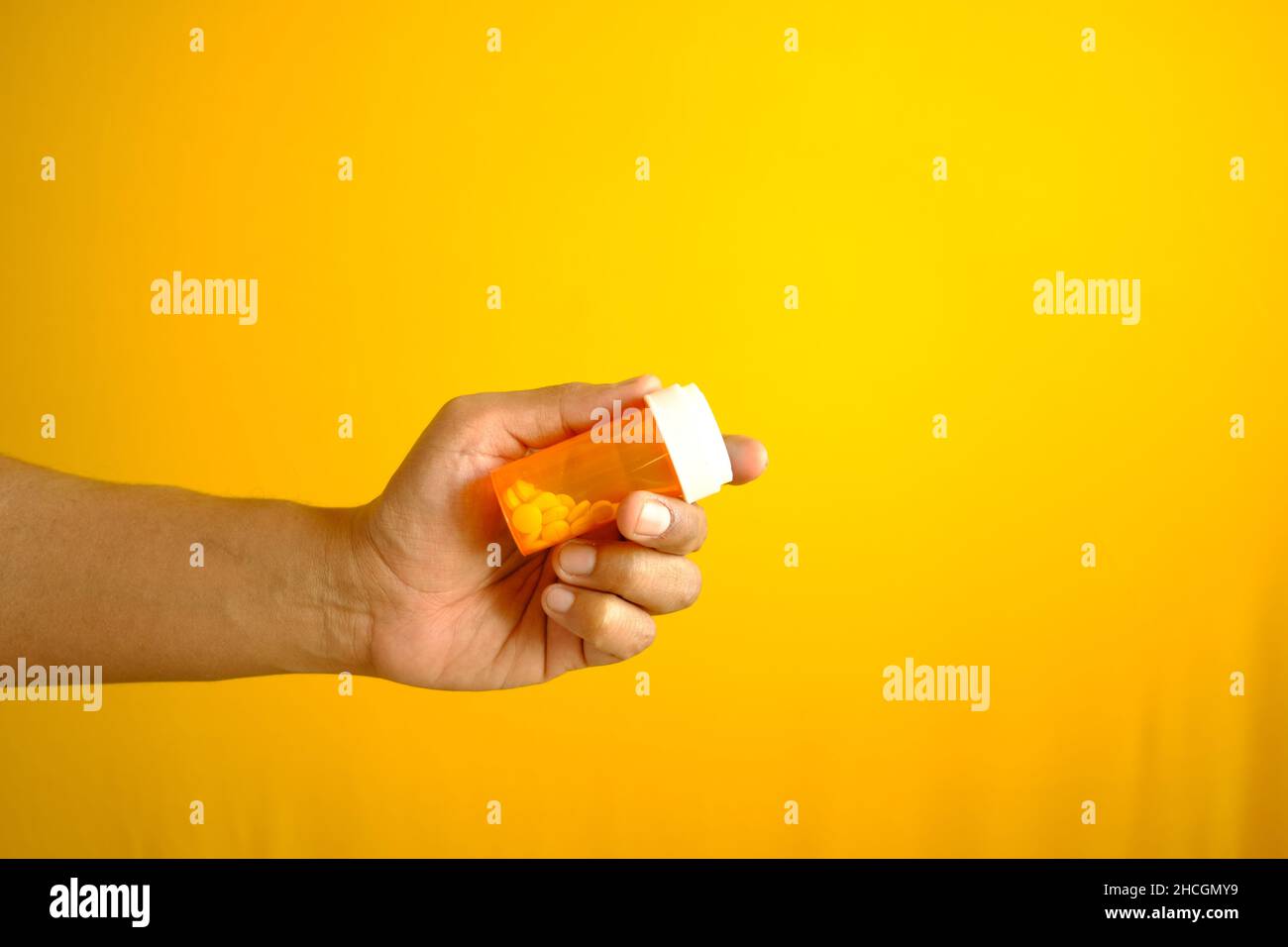 Many pill container hand hi-res stock photography and images - Alamy