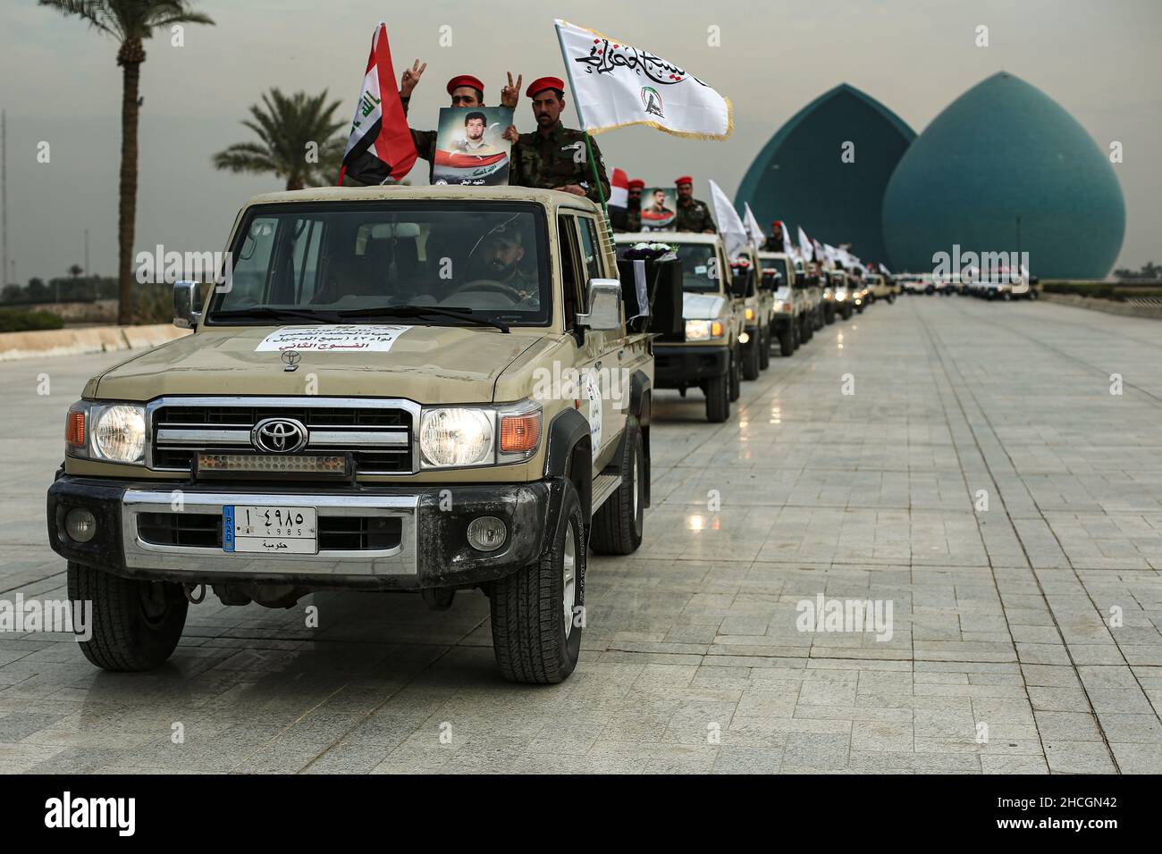 29 December 2021, Iraq, Baghdad: Members of the Iraqi predominantly ...