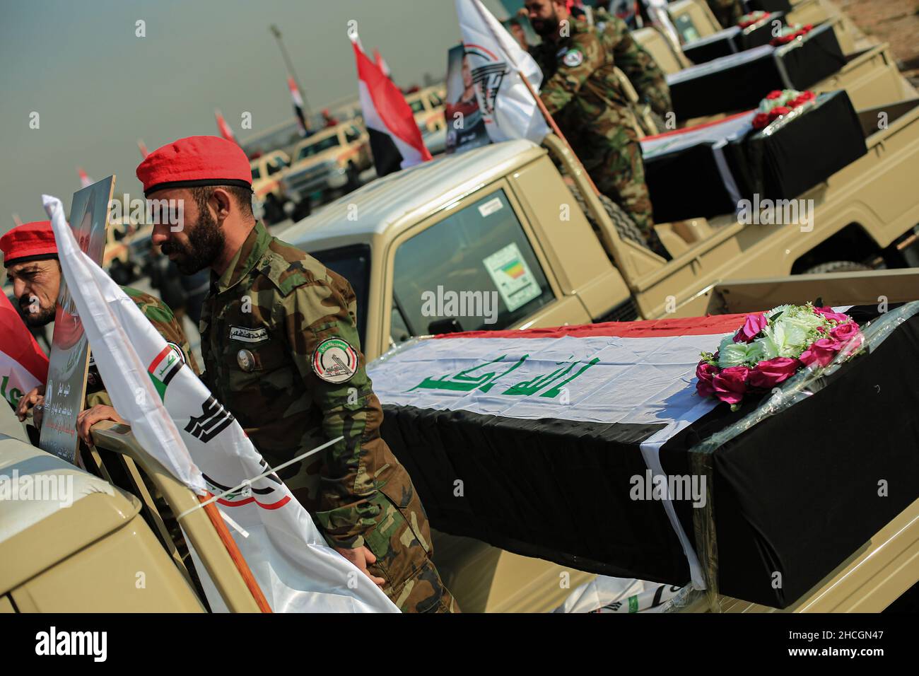 29 December 2021, Iraq, Baghdad: Members of the Iraqi predominantly ...