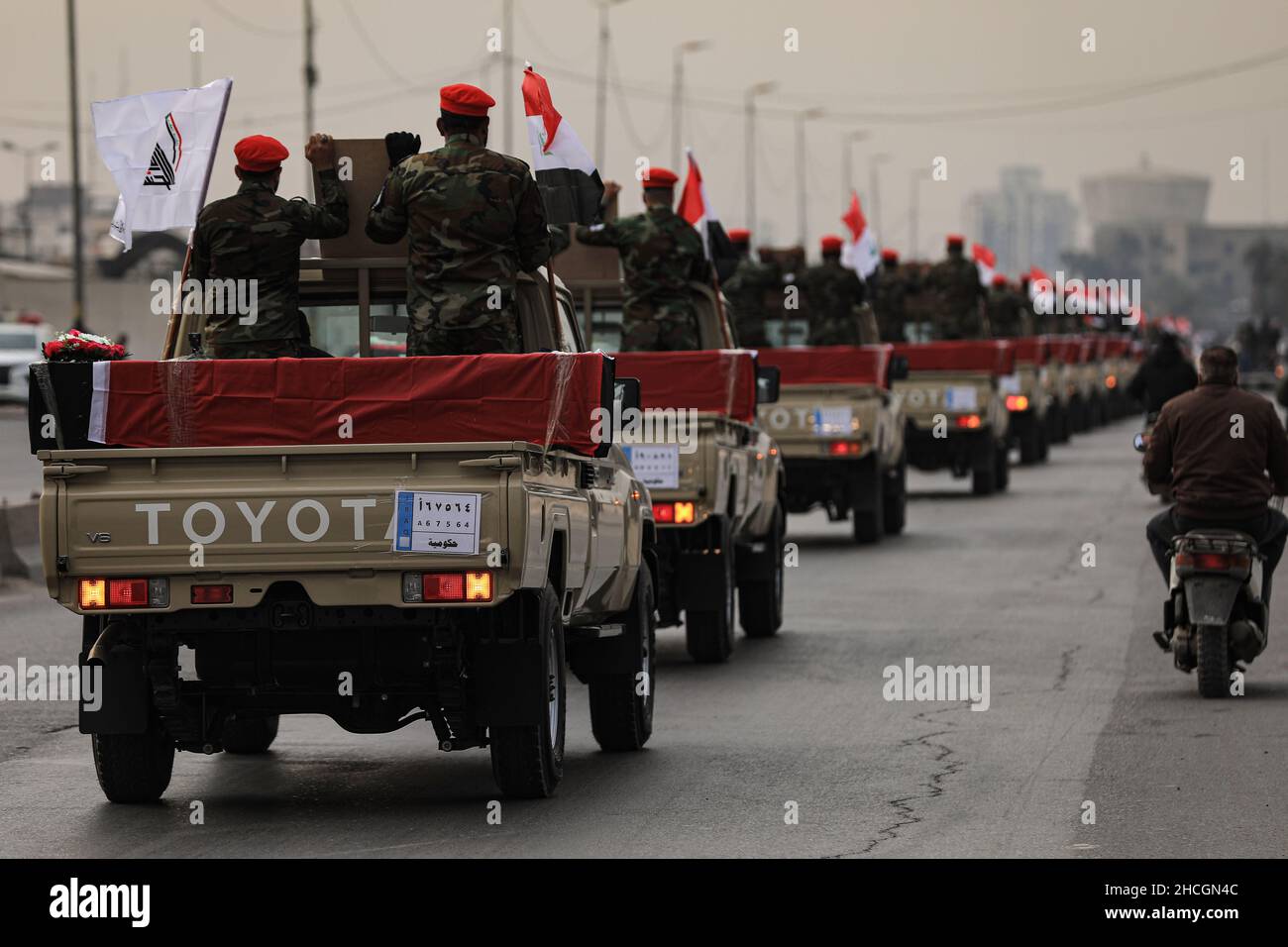 29 December 2021, Iraq, Baghdad: Members of the Iraqi predominantly ...