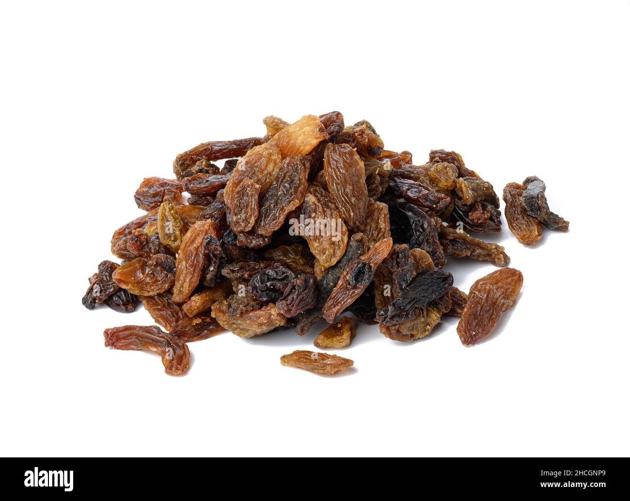 bunch of dried brown raisins isolated on white background Stock Photo ...