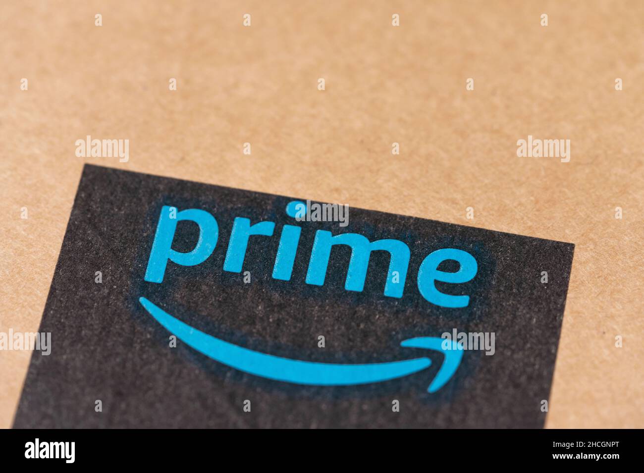 Amazon Prime logotype printed on cardboard box security scotch tape ...