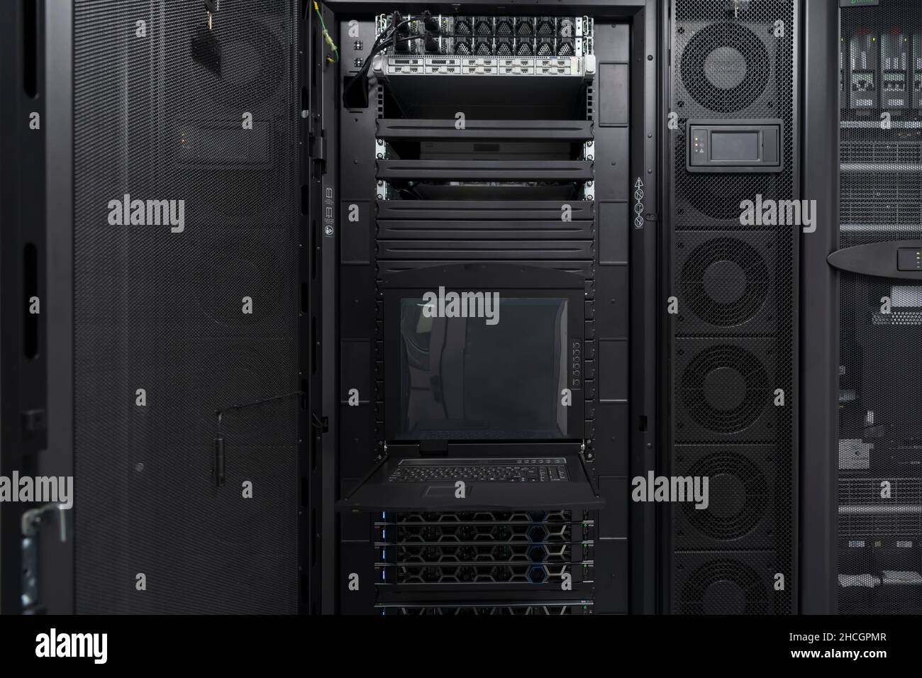 Data Center With Multiple Rows of Fully Operational Server Racks. Modern Telecommunications ...