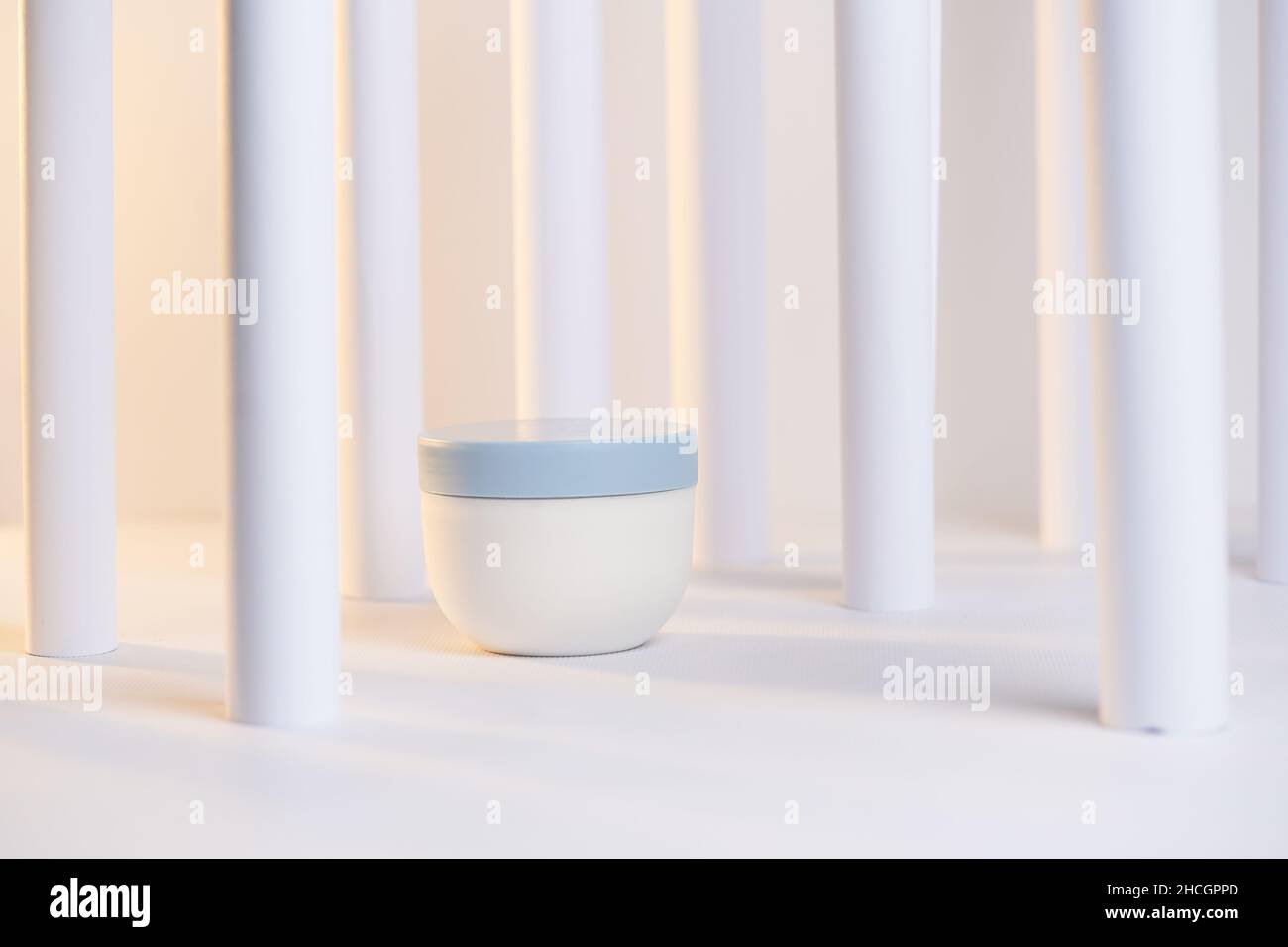 Cosmetic cream on white background with colums Stock Photo - Alamy