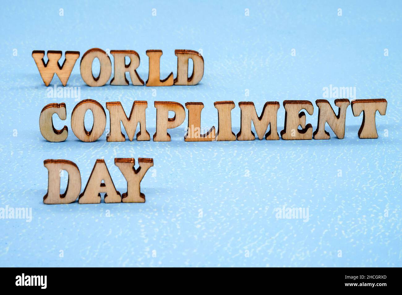 International Compliment Day. Banner with wooden letters. Holiday ...