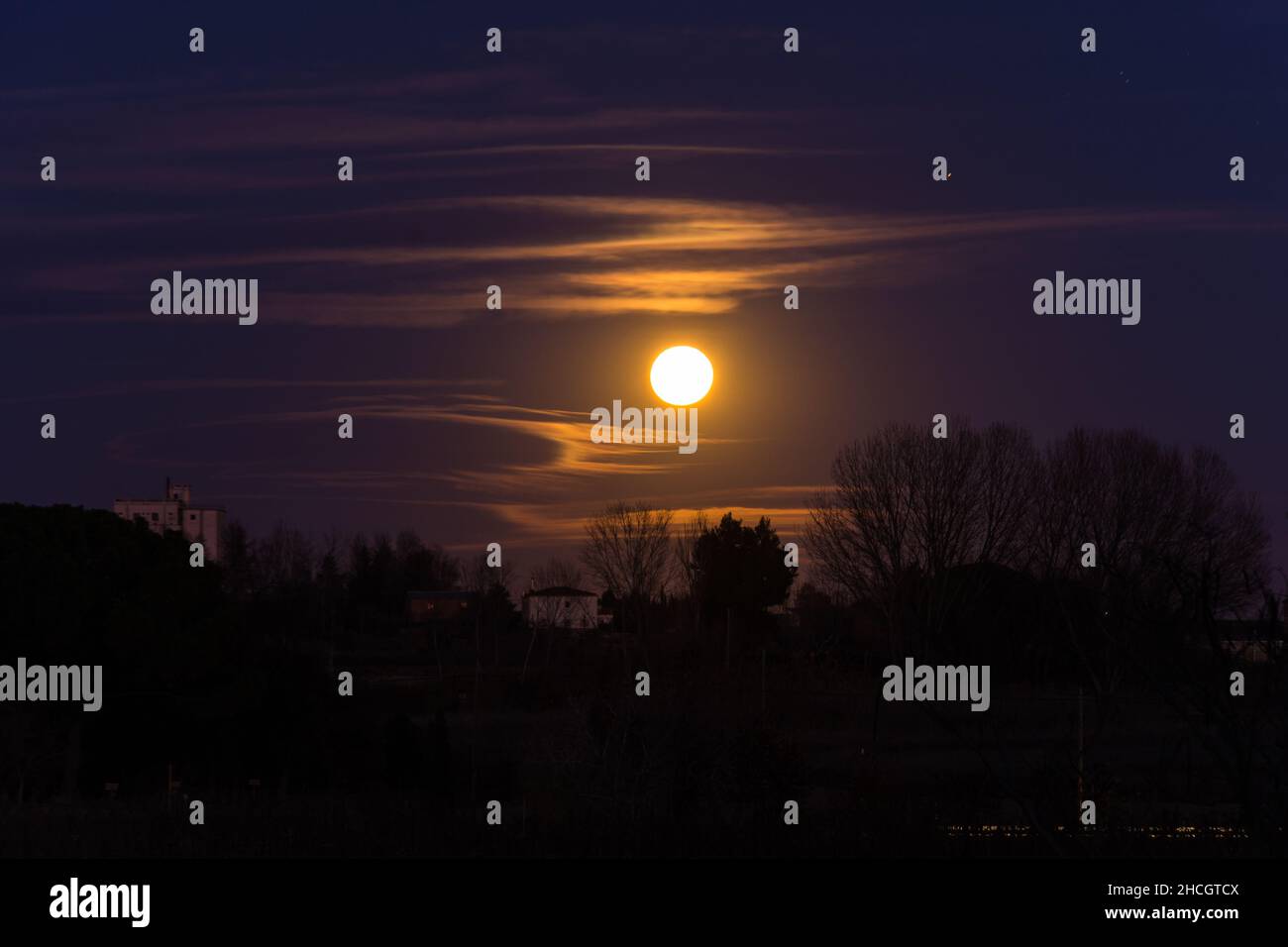 Horizontal image of night landscape with moon, clouds and trees Stock ...