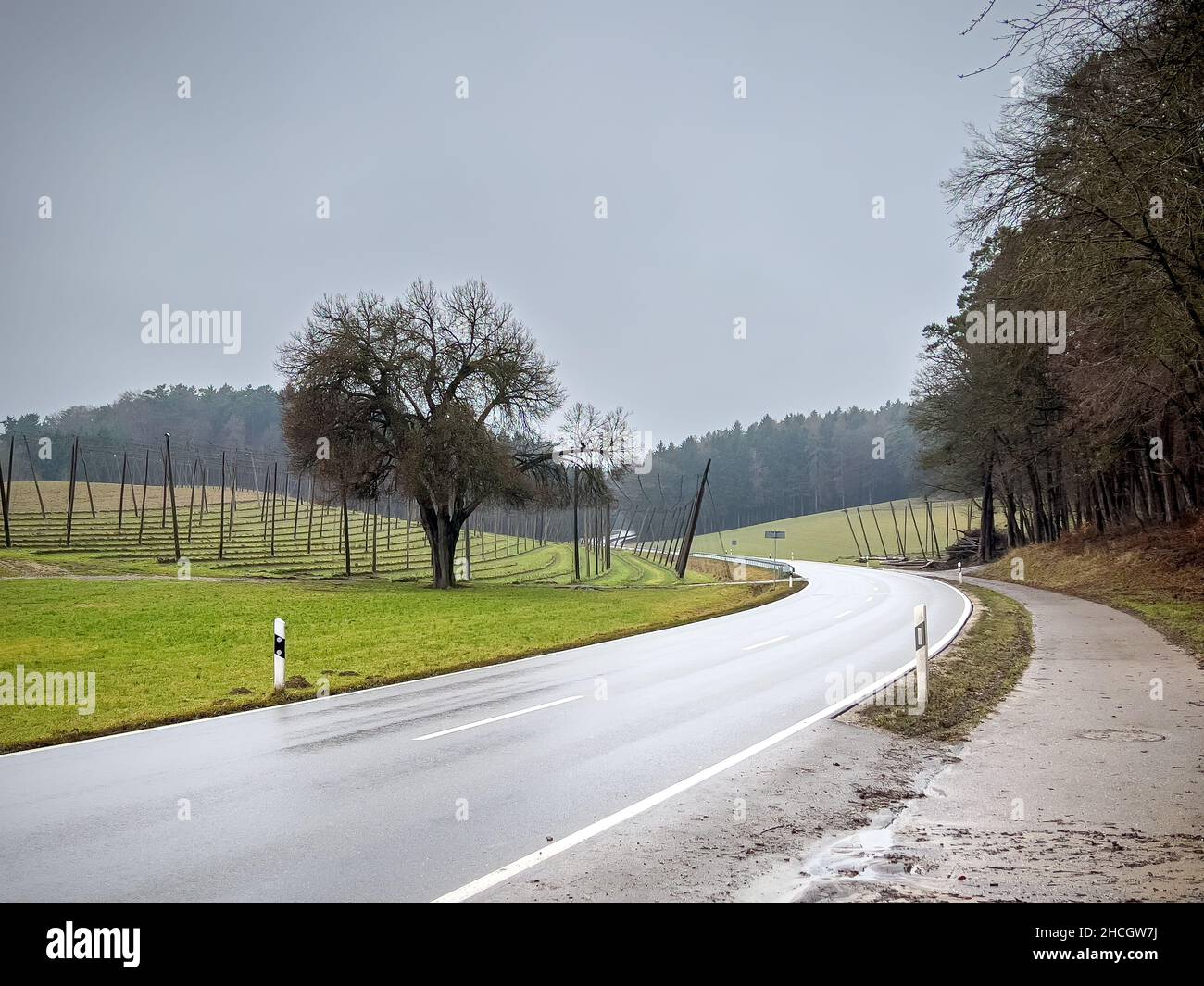 Bavarian Wet Road with dark cloud background Stock Photo - Alamy