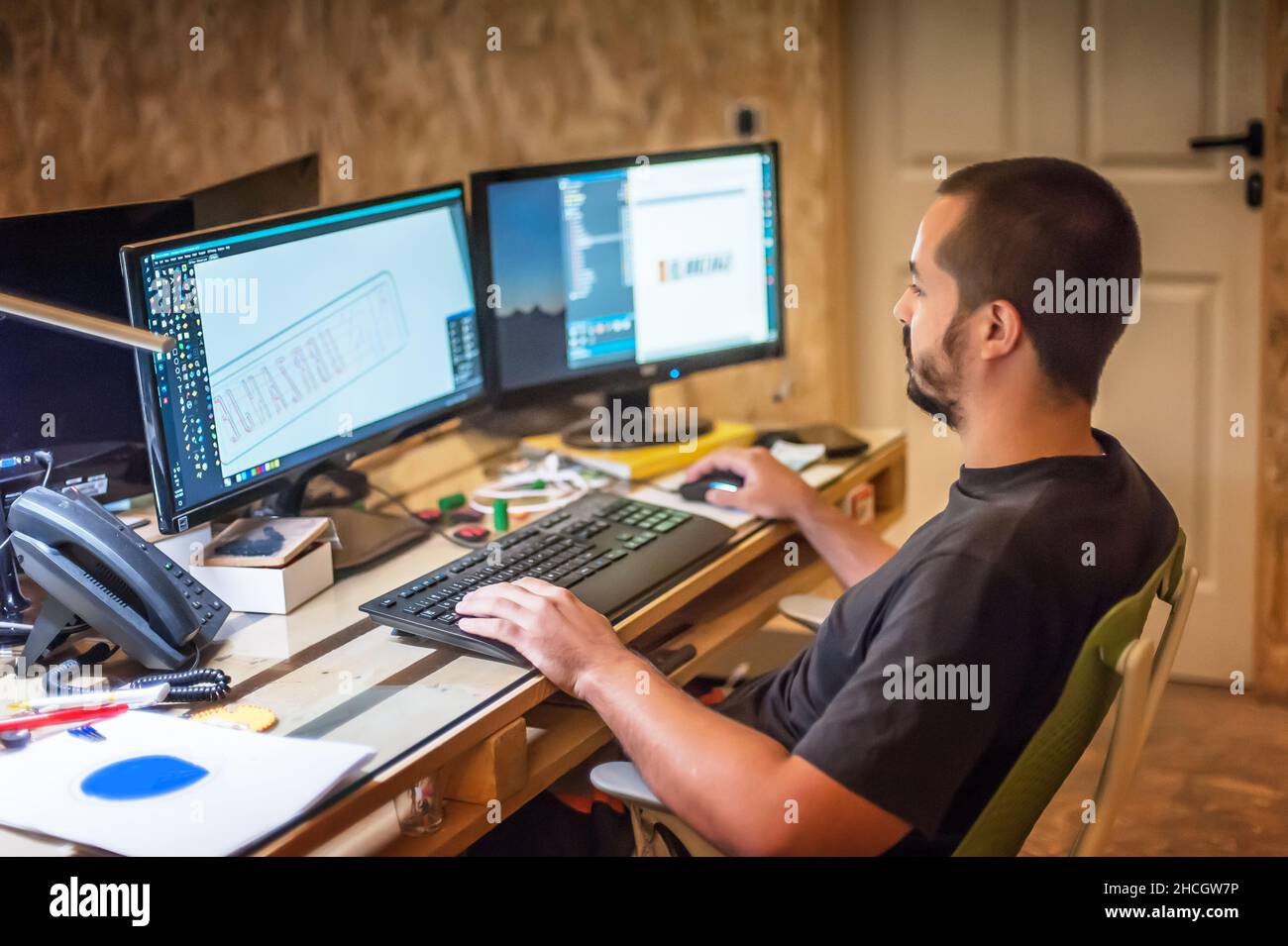 Business man designer works on computer in working office. Corporate ...