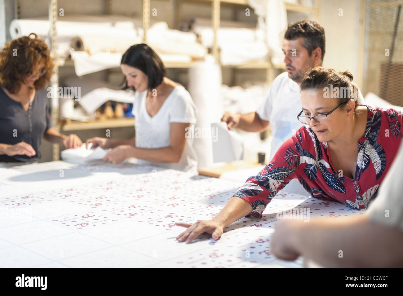 Workers packing products in manufacturing hi-res stock photography and ...