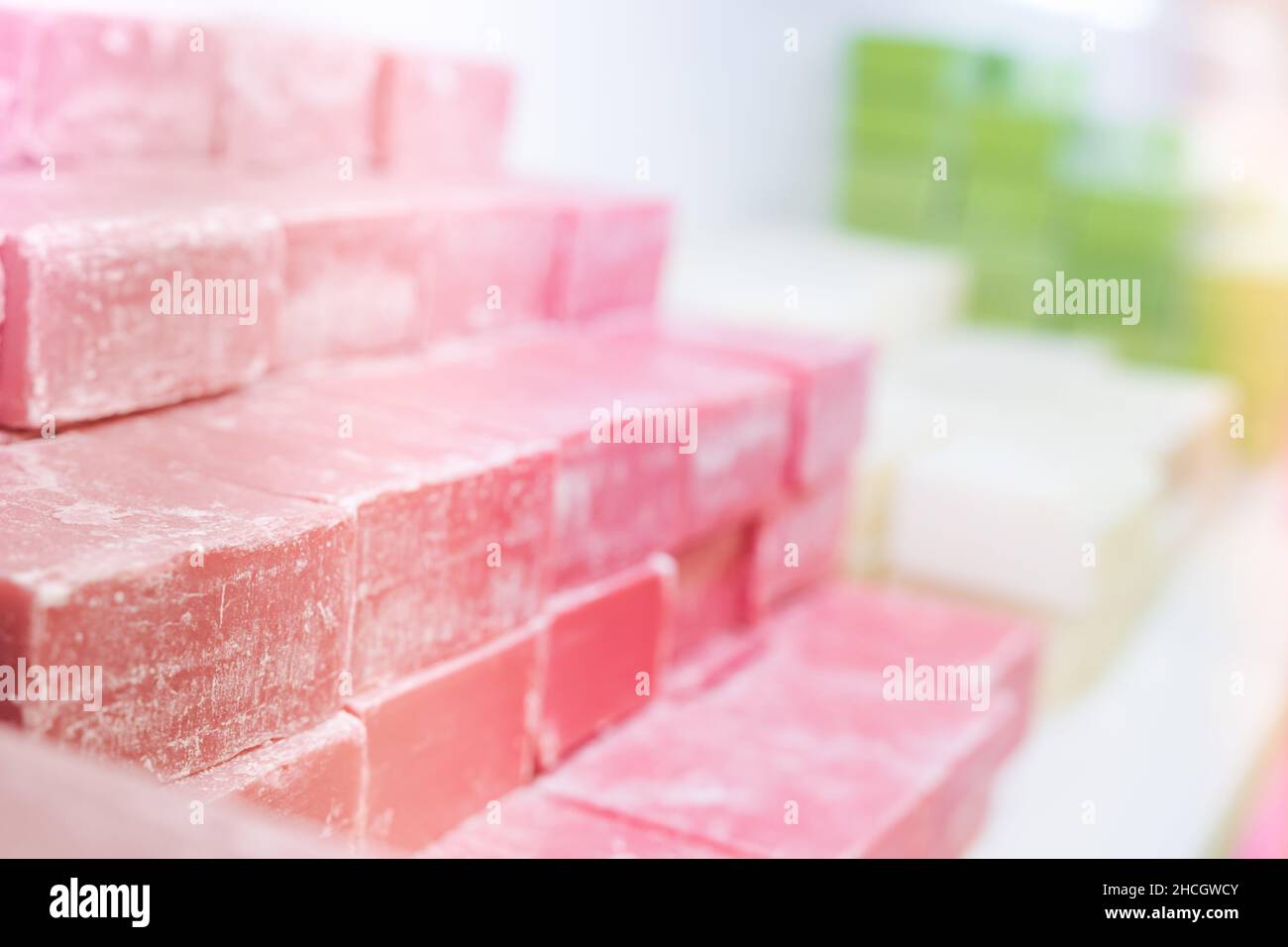 Pink soap pieces in the store with many other colorful turkish soaps on ...