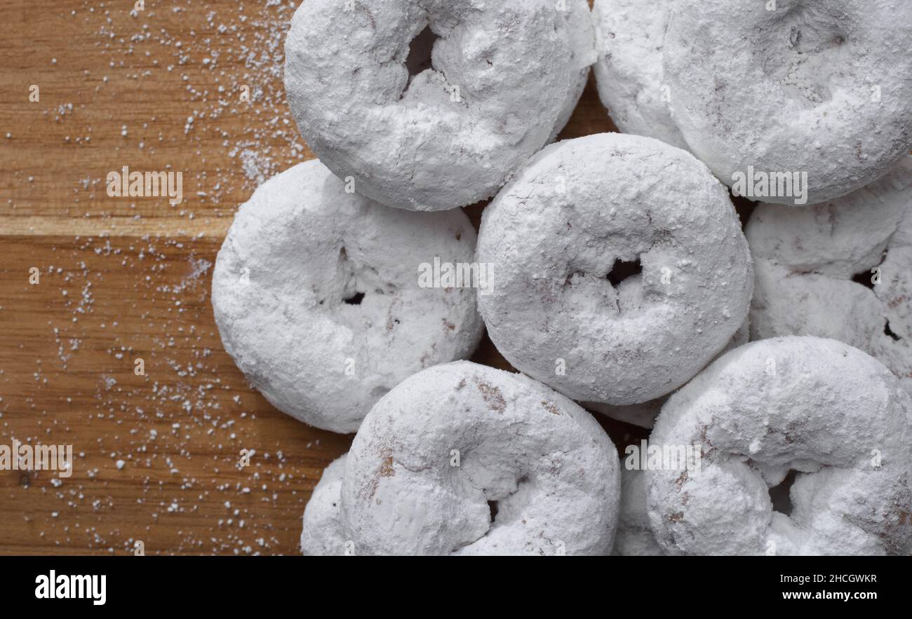 Overhead view of powdered donuts or doughnuts Stock Photo - Alamy