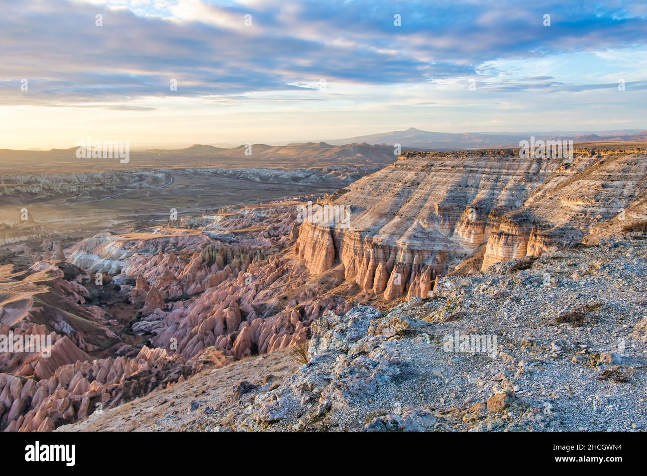 Bright aerial view down to rose valley after sunset over the horizon ...