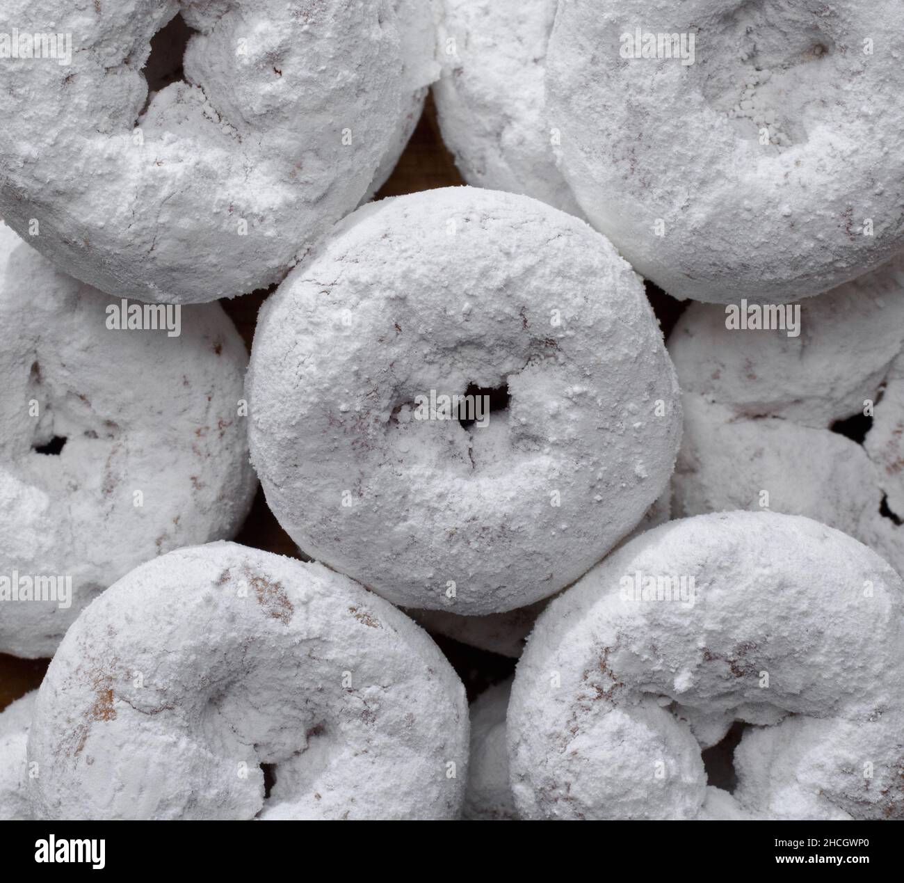 Overhead view of powdered donuts or doughnuts Stock Photo - Alamy
