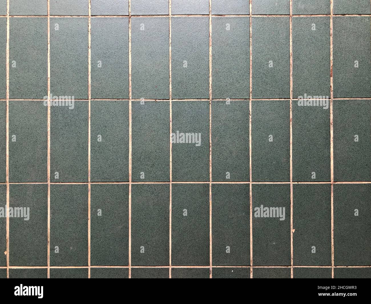 Rectangle shape green floor tiles background texture Stock Photo - Alamy