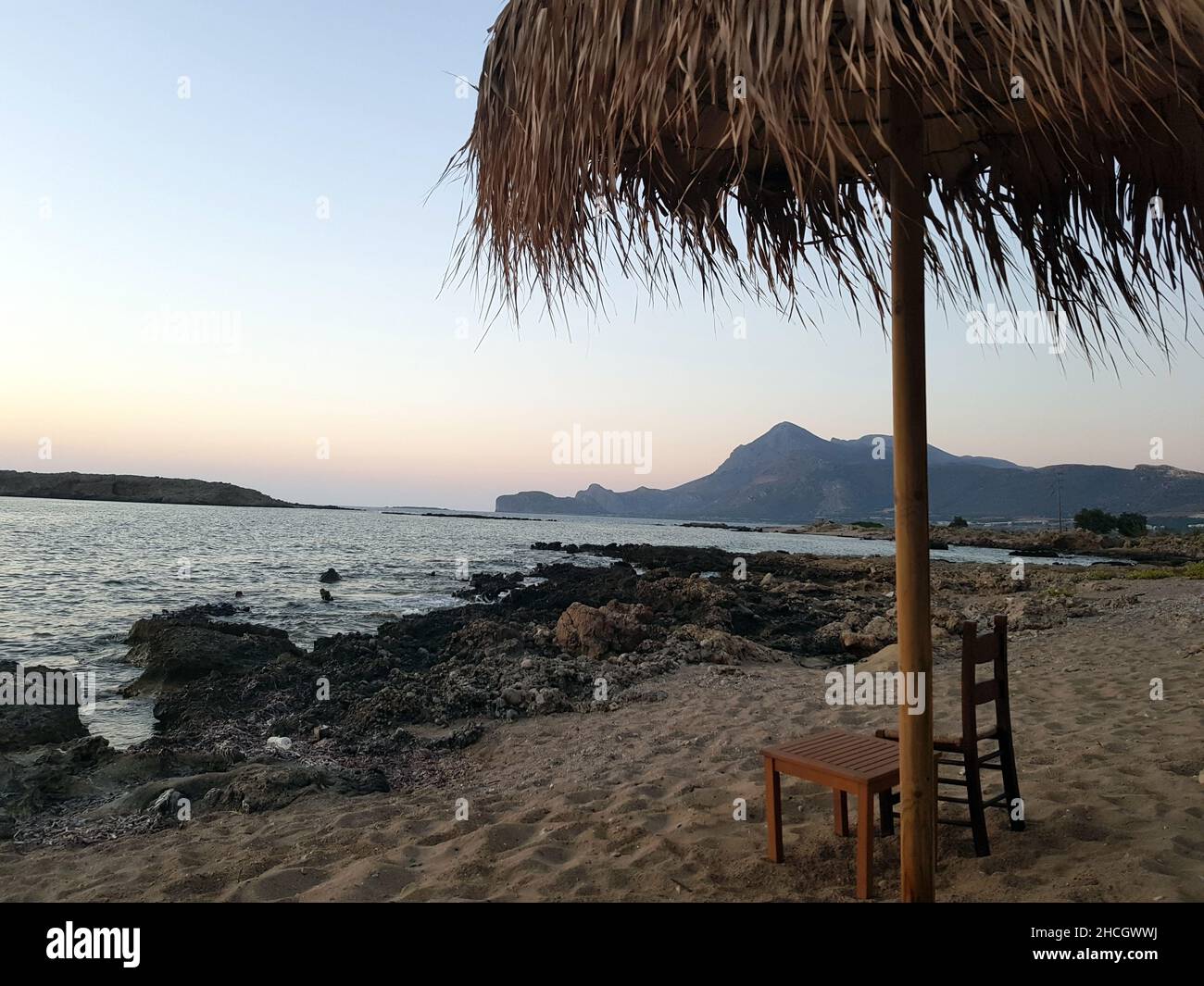 Sunset on the beach in Crete, Greece Stock Photo - Alamy