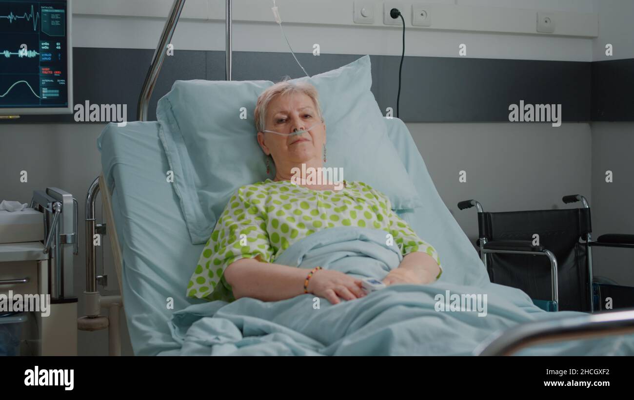 Portrait pensioner disease laying in hi-res stock photography and ...