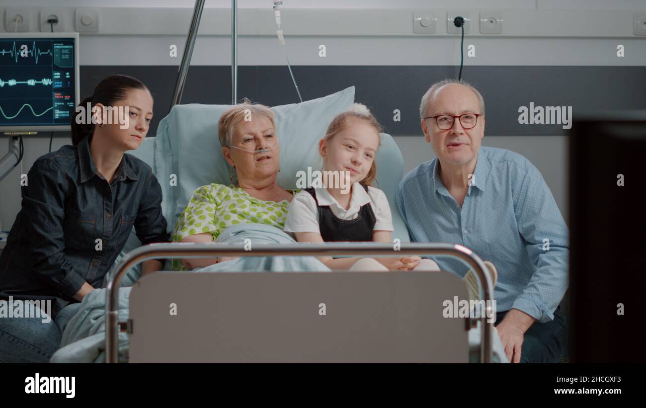 Hospital patient watching tv in bed hi-res stock photography and images ...