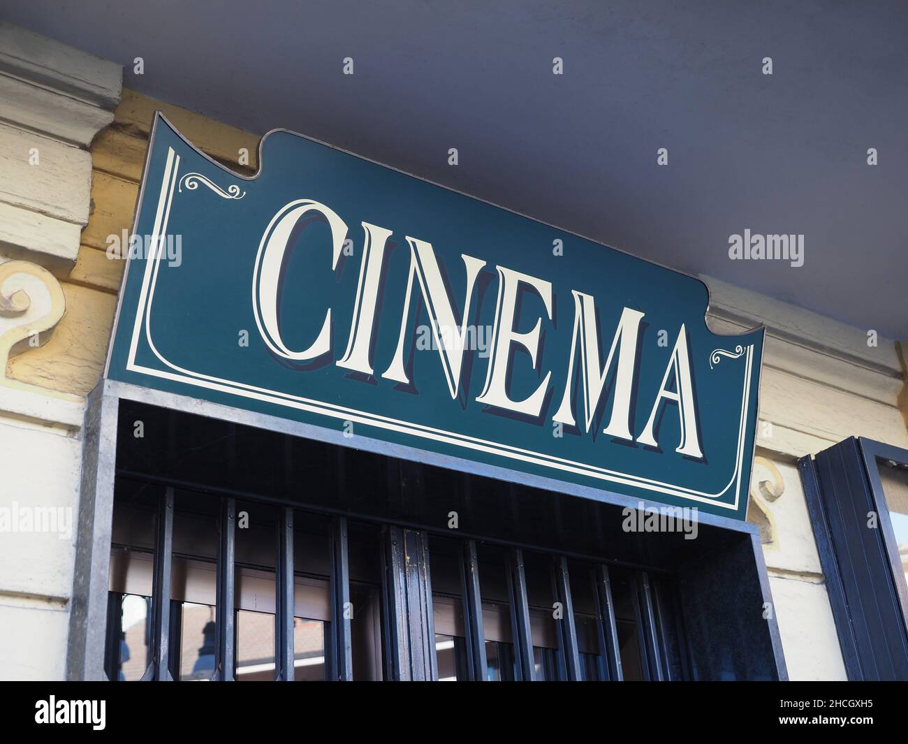 cinema movie theater front sign over building entrance Stock Photo - Alamy
