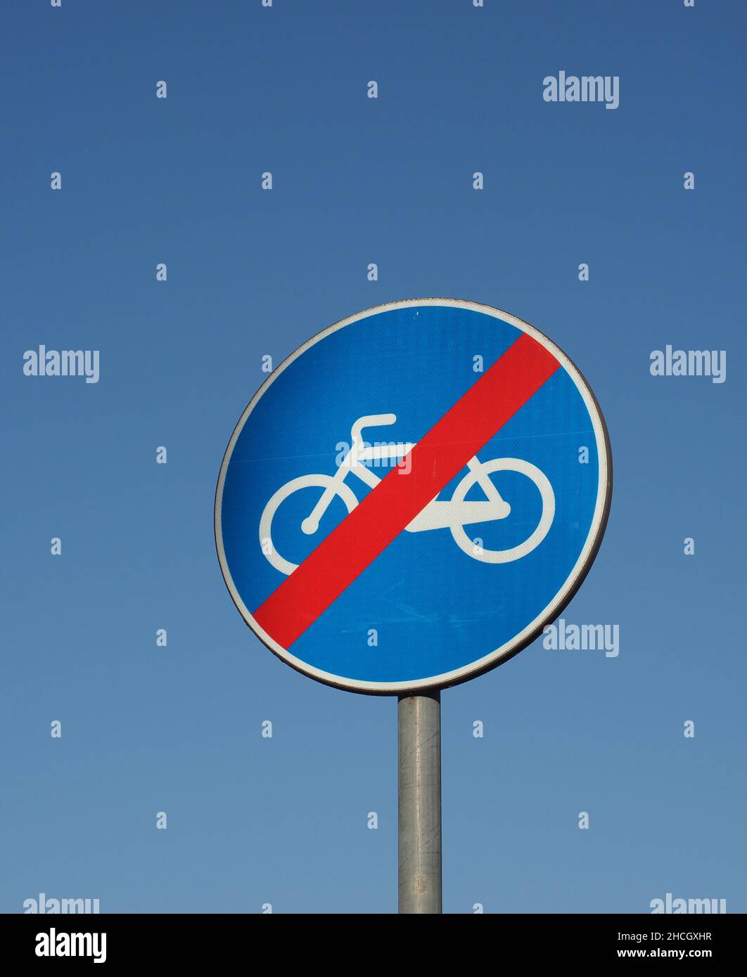 End of Bike lane (aka cycle lane) traffic sign over blue sky Stock ...
