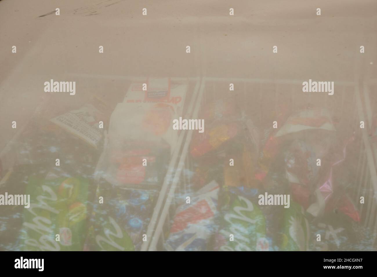 Ice cream cooler covered in a dust, dirt film, layer during a historic ...