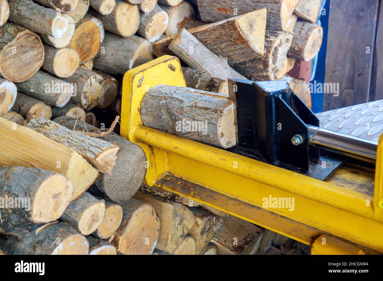 Automated splitting firewood logs processing machine equipment Stock ...