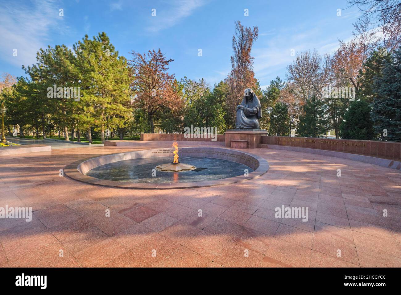 The eternal fire flam and wailing mother statue. At Memorial Square in ...